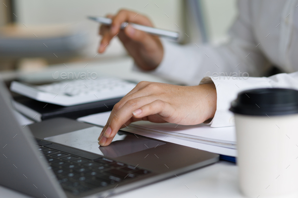 Businesswoman accountant expert analyze business report graph and ...