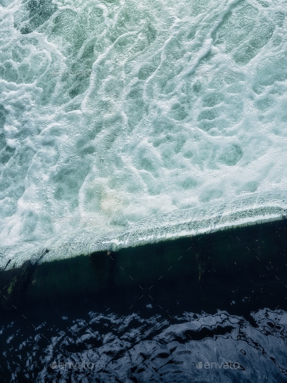 Detail of a water raft with dark water below and light foam above Stock ...