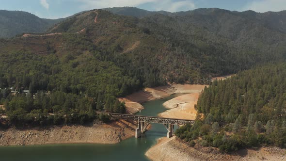 Aerial view of bridge over Shasta Lake in Northern California low water ...