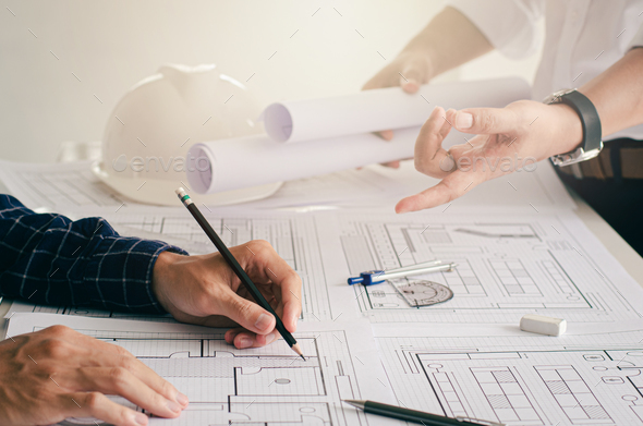 Engineer preparing drawing of construction structure Working on ...