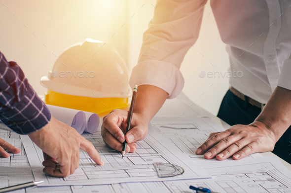 Engineer preparing drawing of construction structure Working on ...