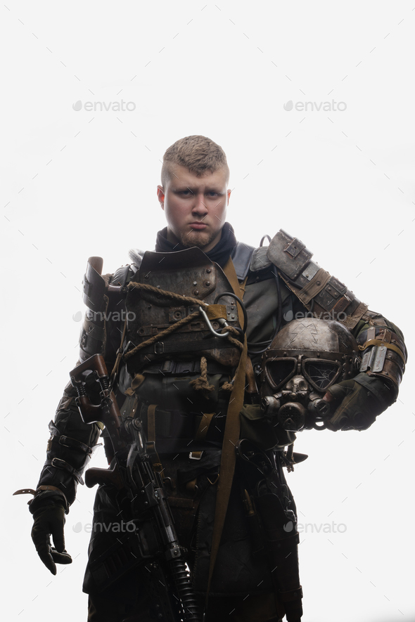Military soldier in spirit of post apocalypse holding gas mask Stock ...