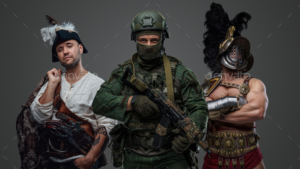 Modern soldier with medieval pirate and gladiator on his sides Stock ...