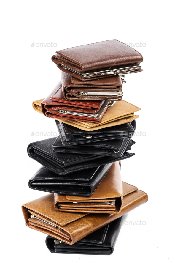 Stack of different wallets on white background Stock Photo by BLACKDAY