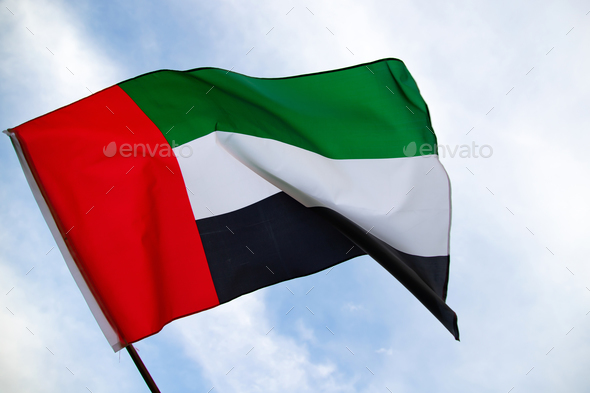 Waving fabric texture of the flag with color of United Arab Emirates ...