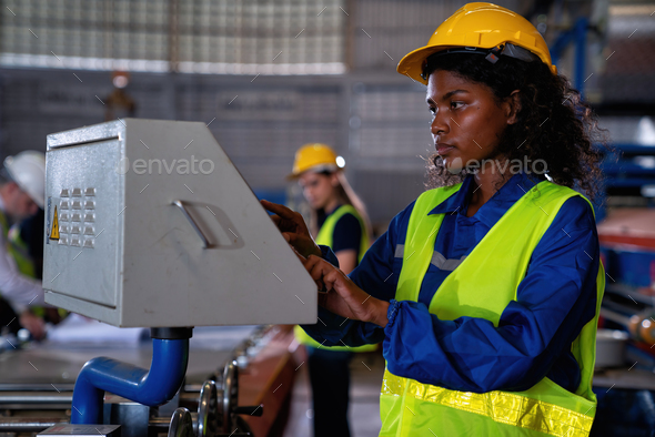 Female engineering operator wearing uniform Quality control maintenance ...