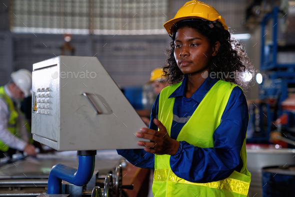 Female engineering operator wearing uniform Quality control maintenance ...