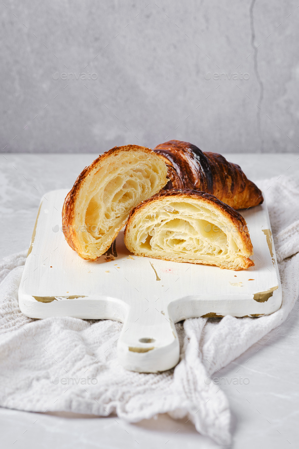 Cross section of classic croissant on bright background Stock Photo by ...