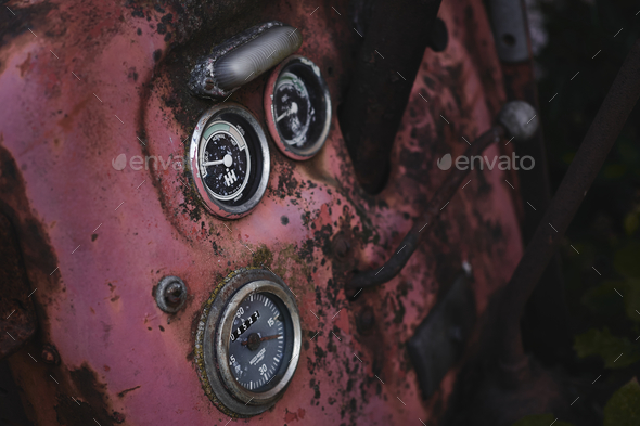Closeup of a speedometer of an old rusty abandoned car with a blurry ...