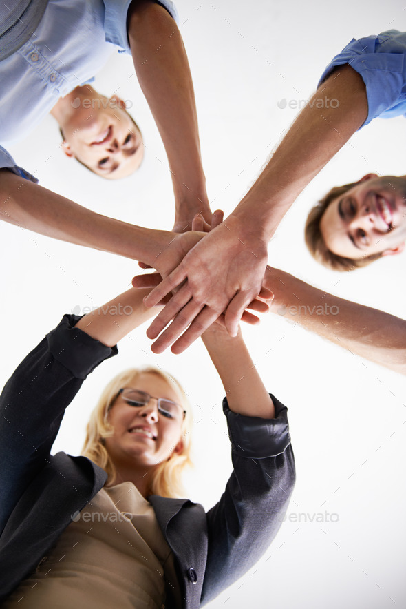 Looking up at the perfect team Stock Photo by YuriArcursPeopleimages