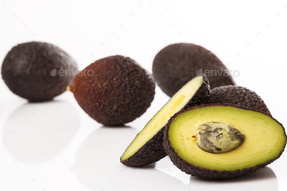 Pile of small avocados Stock Photo by BLACKDAY | PhotoDune