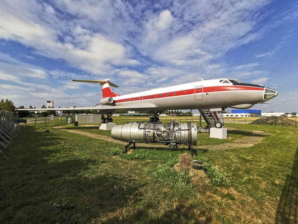 Closeup shot of an aircraft with a red line in the middle under a ...