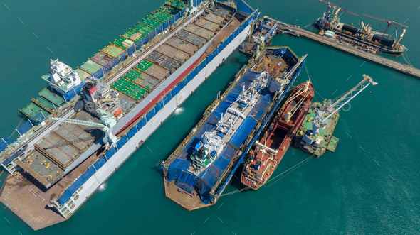 Oil tanker ship at dry dock concept maintenance service. working at dry ...