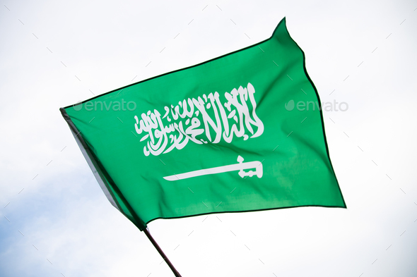 Official flag of the Kingdom of Saudi Arabia. Stock Photo by erika8213