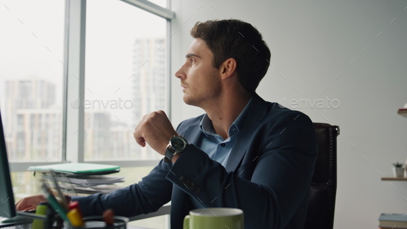 Thinking man typing keyboard in glass office closeup. Creative designer ...
