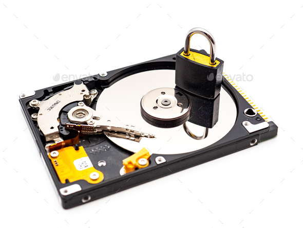 Internal hard drive and a lock and keys Stock Photo by wirestock ...
