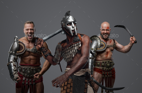 Three ancient gladiators with light armors and swords Stock Photo by ...