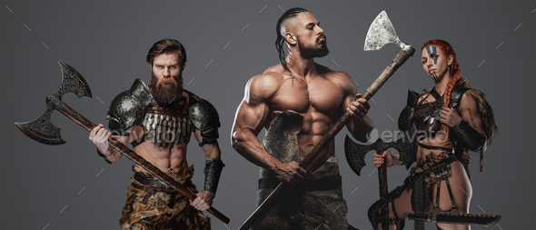 Three ancient vikings barbarians with muscular builds and axes Stock ...