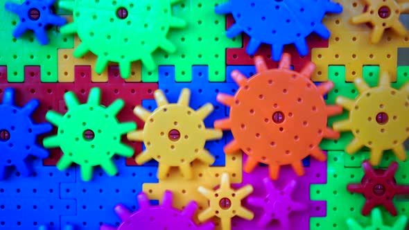 Plastic Toy Cogwheel Working for Common Goal Conceptual, Stock Footage