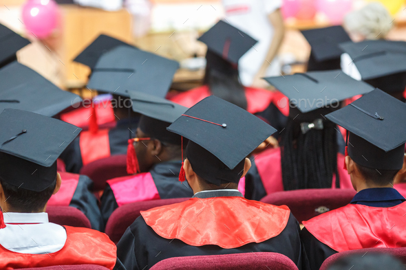 Foreign medical students in square academic graduation caps and black ...