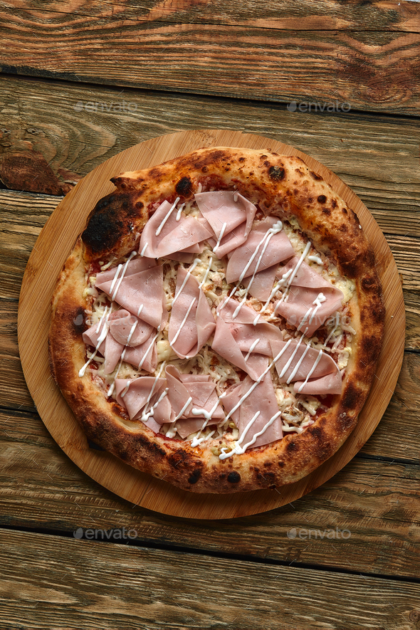 Meat Italian pizza with roast beef, steak slices, melted cheese, with ...