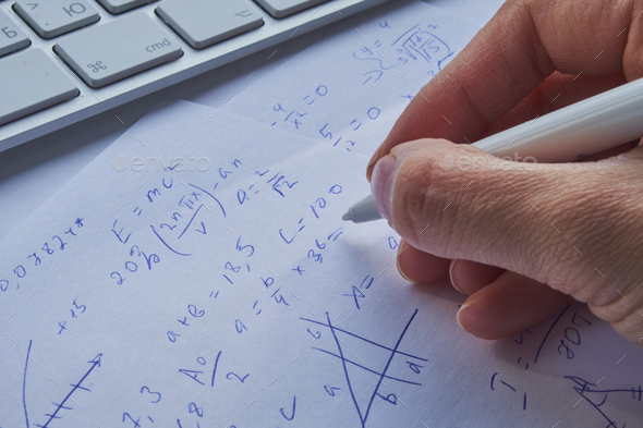 sheet of paper filled with calculations as a background. Stock Photo by ...