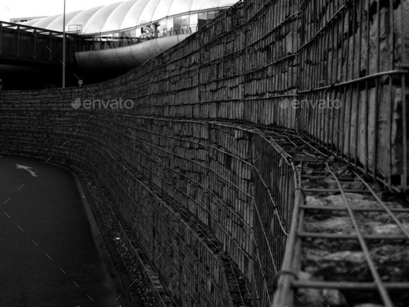 Dramatic grayscale of an unfinished construction of a building ...