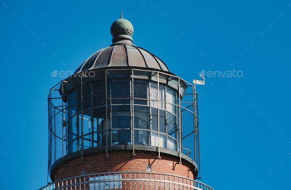 Architecture of a water tower against the blue sky Stock Photo by wirestock