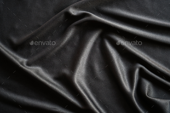 Black shiny fabric texture can be use as background Stock Photo by tendo23
