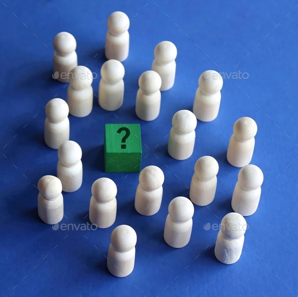 Question mark surrounded by a crowd. Stock Photo by mohdizzuanbinroslan