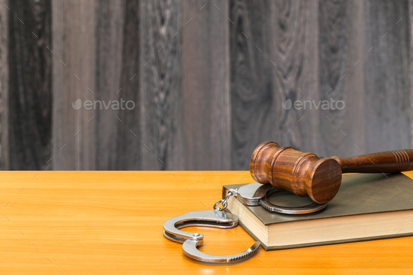 Gavel, books and handcuffs Stock Photo by FabrikaPhoto | PhotoDune