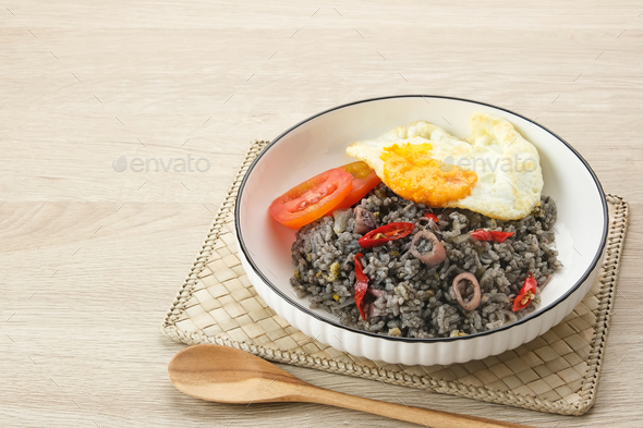 Nasi Goreng Cumi Hitam or Black Squid Fried Rice Stock Photo by ...