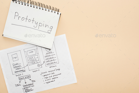 top view of website design template and notebook with prototyping ...