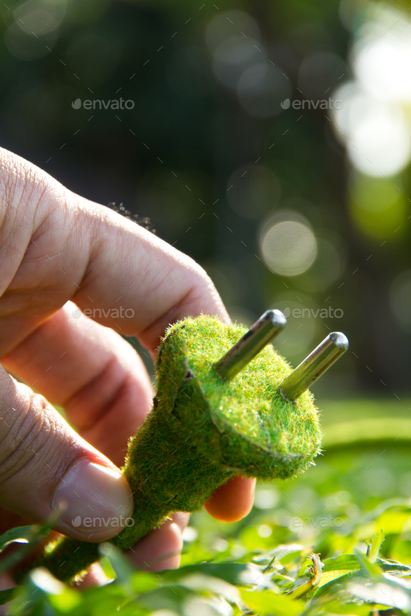 Green electric plug concept Stock Photo by osbmxhouse | PhotoDune