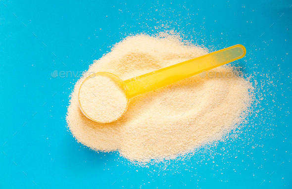 Powdered Milk, Baby Formula with spoon infant formula in can and bottle ...