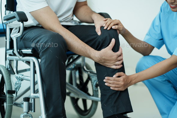 Orthopedic doctor checkup knee bone disability wheel chair patient ...