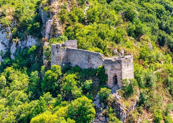 Soko Grad surrounded by green, lush trees, Sokobanja, Serbia Stock ...