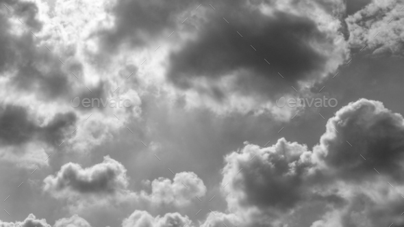 Stormy dark cloudy sky. Black and white fluffy clouds in the sky. Stock ...