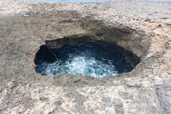 Underground spring with bubbling water. Stock Photo by alexandrabeganskaya