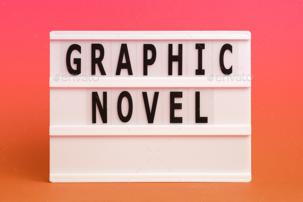 The word graphic novel on lightbox isolated pink background. Literary ...