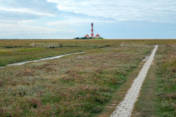 Lighthouse Westerhever at the Northern Sea, Germany Stock Photo by ...