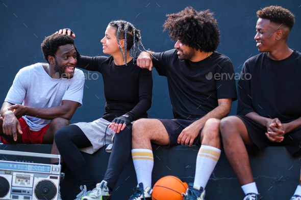 Group of people together laughing and listening to music Stock Photo by ...