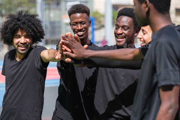 Street basketball team fighting together Stock Photo by isitophotostock