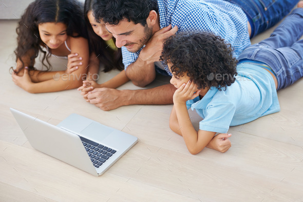 Enthralled by the internet Stock Photo by YuriArcursPeopleimages ...
