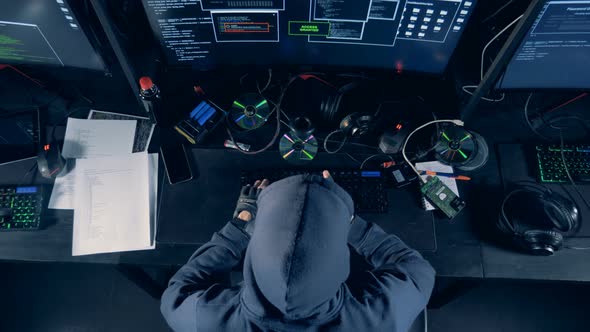 A Person Cracking Computer. Hacker Cracks System, Using Computer ...