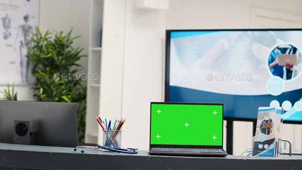 Laptop with greenscreen display at desk Stock Photo by DC_Studio ...