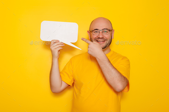 Man holding an empty white cardboard cloud Stock Photo by Impactphotography