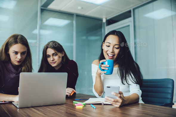 Group of women collaborating in workplace Stock Photo by GaudiLab ...