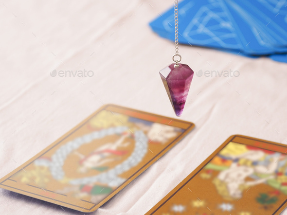 Fortune telling at Tarot Pendulum Stock Photo by cait00sith | PhotoDune