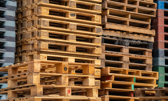Stack of wooden pallet. Industrial wood pallet at factory warehouse ...